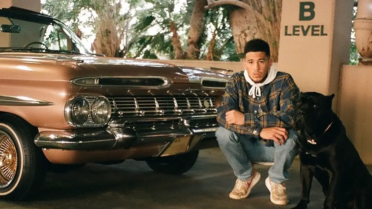 Phoenix Suns' Devin Booker shows his passion for luxury cars